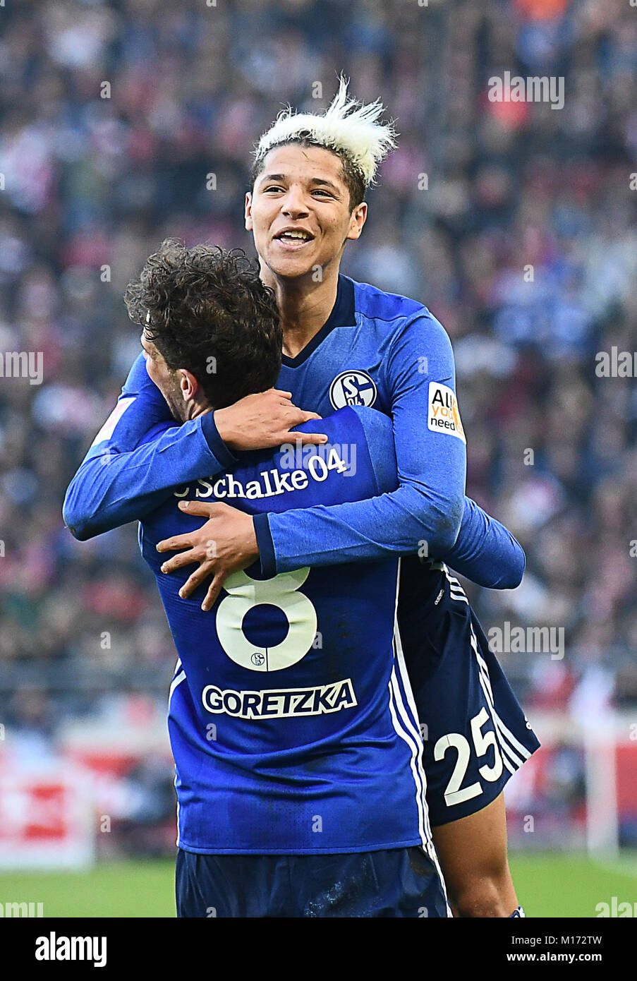 Schalke's Amine Harit (top) and Leon Goretzka celebrate after the goal ...