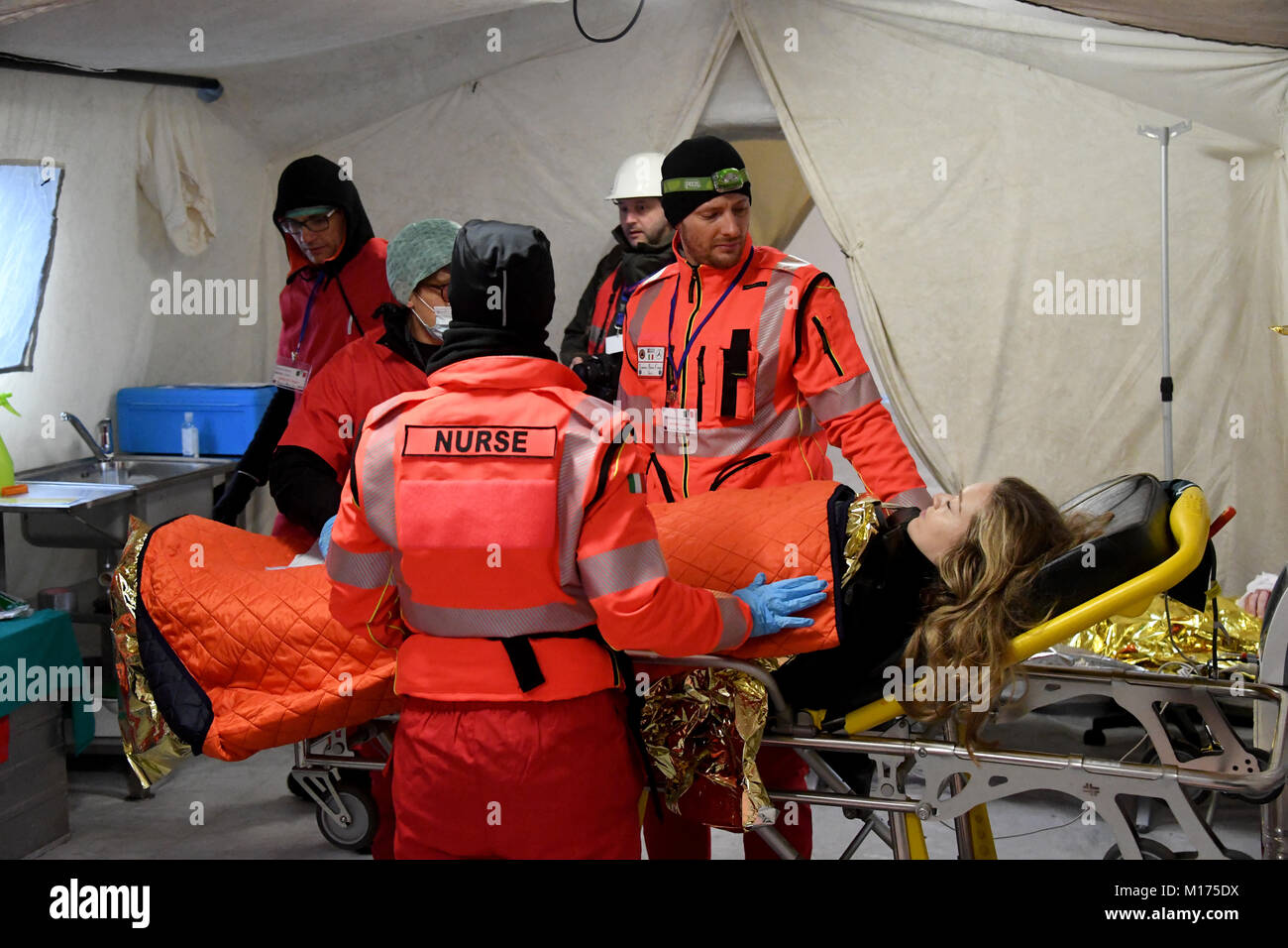 Tinglev, Denmark. 27th Jan, 2018. An actor playing a victim is tended ...