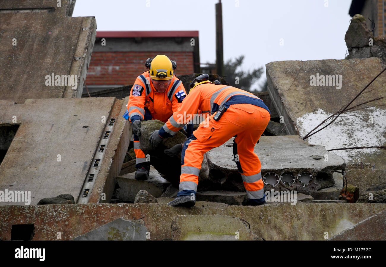 Tinglev, Denmark. 27th Jan, 2018. Rescue forces rehearse upon the ...