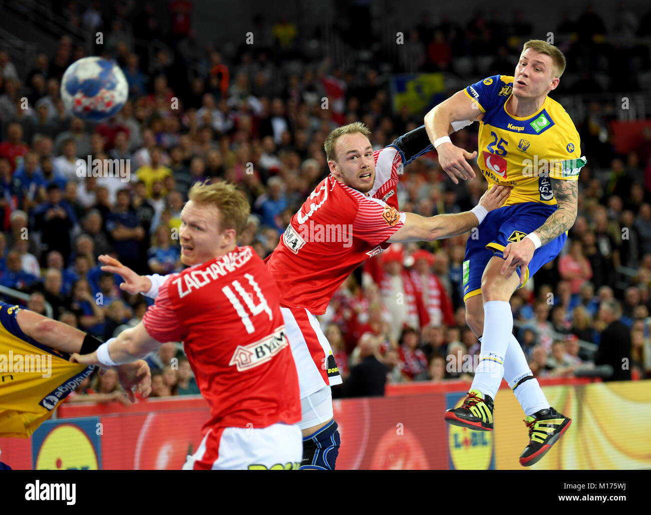 Sweden's Linus Arnesson (R) plays against Denmark's Henrik Toft Hansen ...