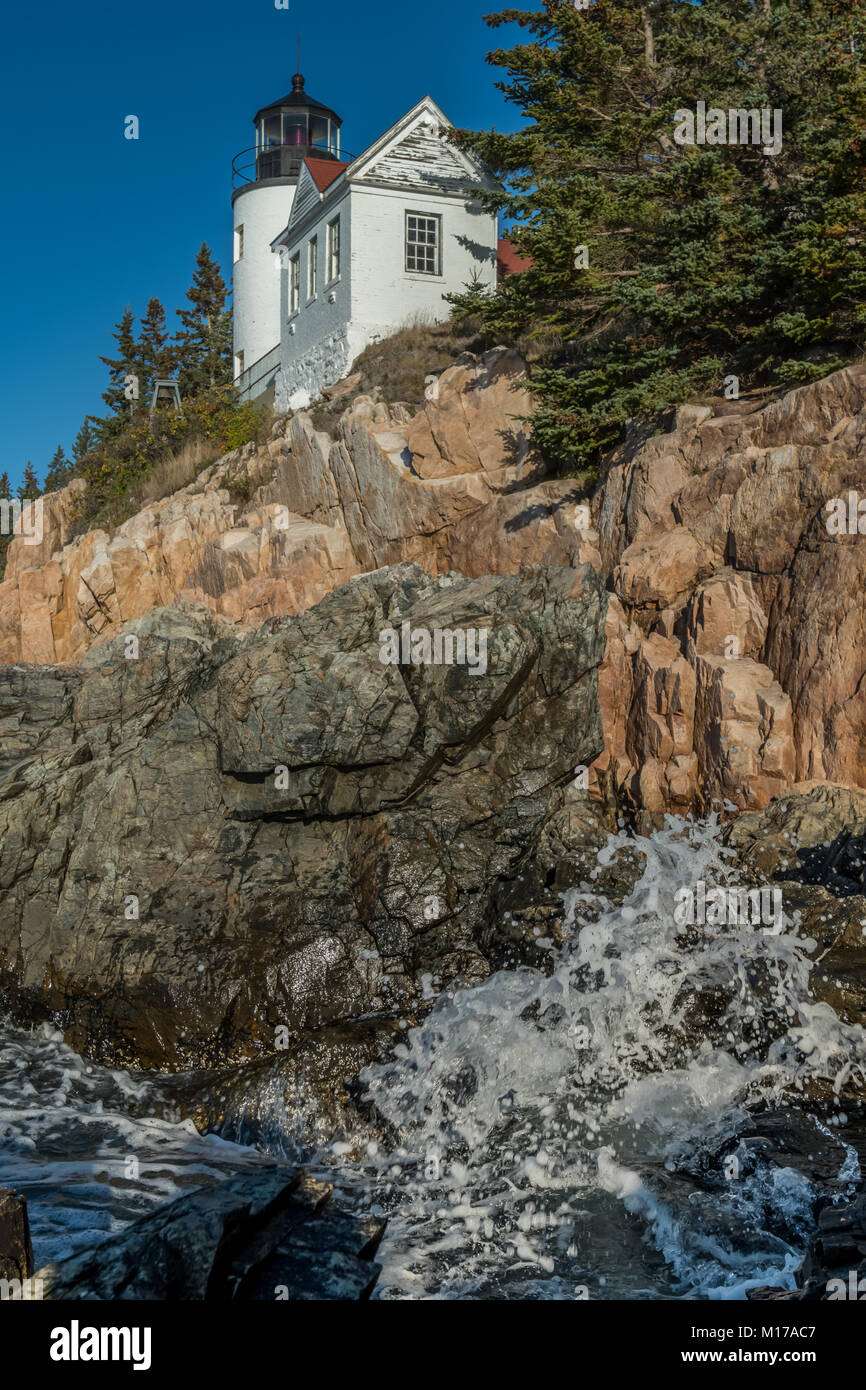 Wave Crashes Below Bass Harbor Lighthouse in Acadia Stock Photo - Alamy