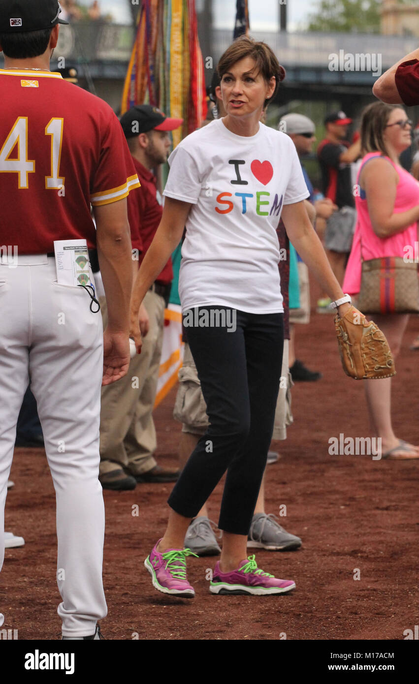 Iowa Governor Kim Reynolds near the home dugout prior to throwing a ...