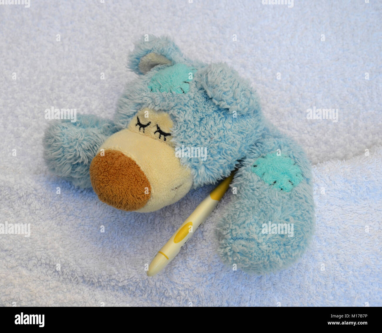 Poor sick teddy in bed Stock Photo - Alamy