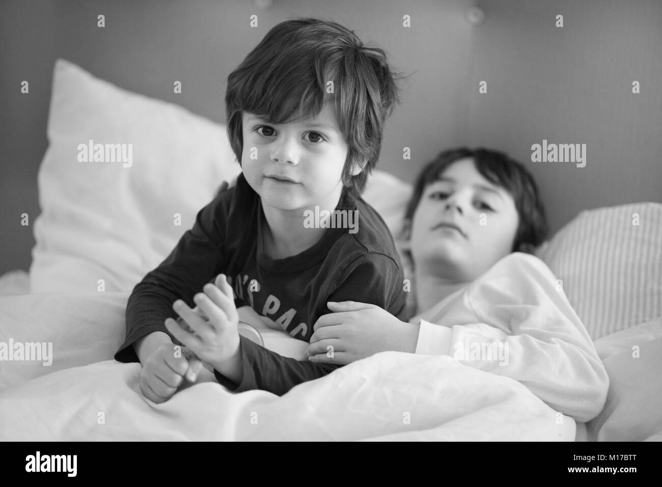 Siblings attachement Black and White Stock Photos & Images - Alamy