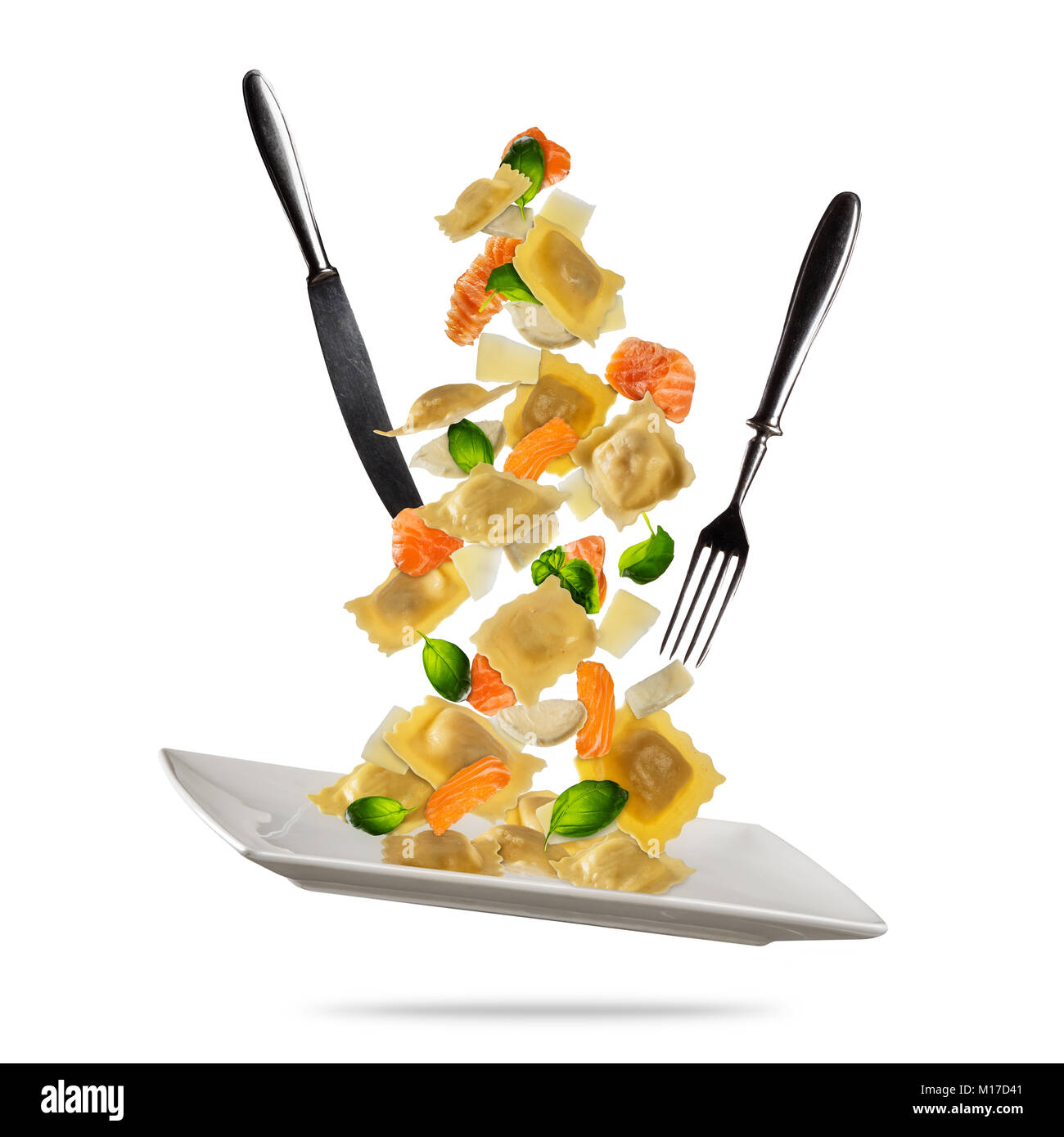 Concept of flying food with traditional italian ravioli and vegetable ...