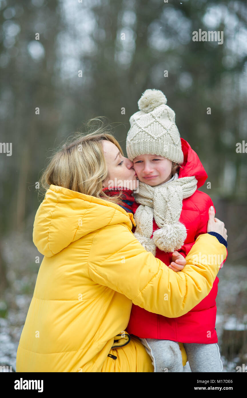 Mother consoles daughter hi-res stock photography and images - Alamy