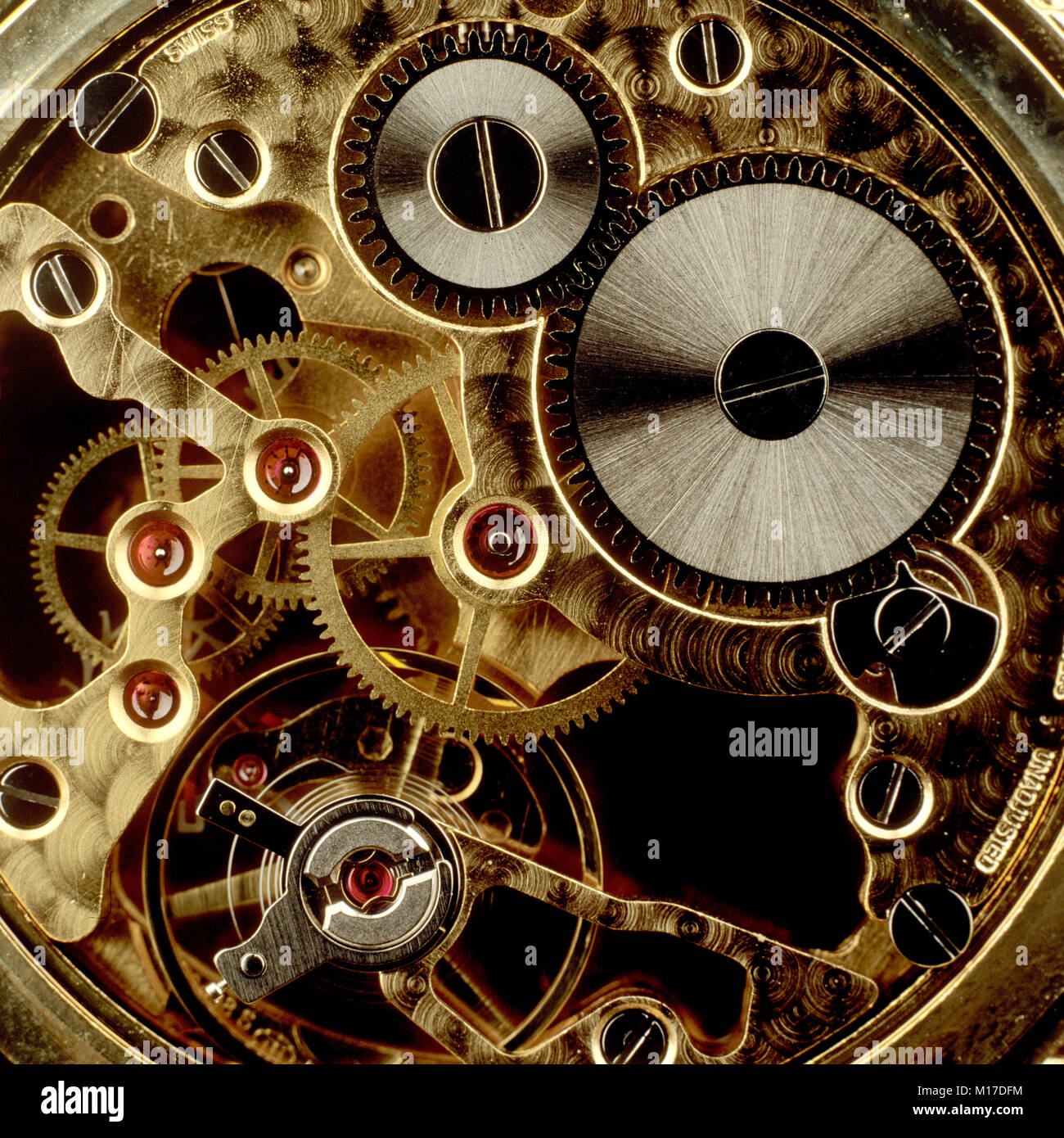Cogs in an old watch mechanism, close-up Stock Photo - Alamy