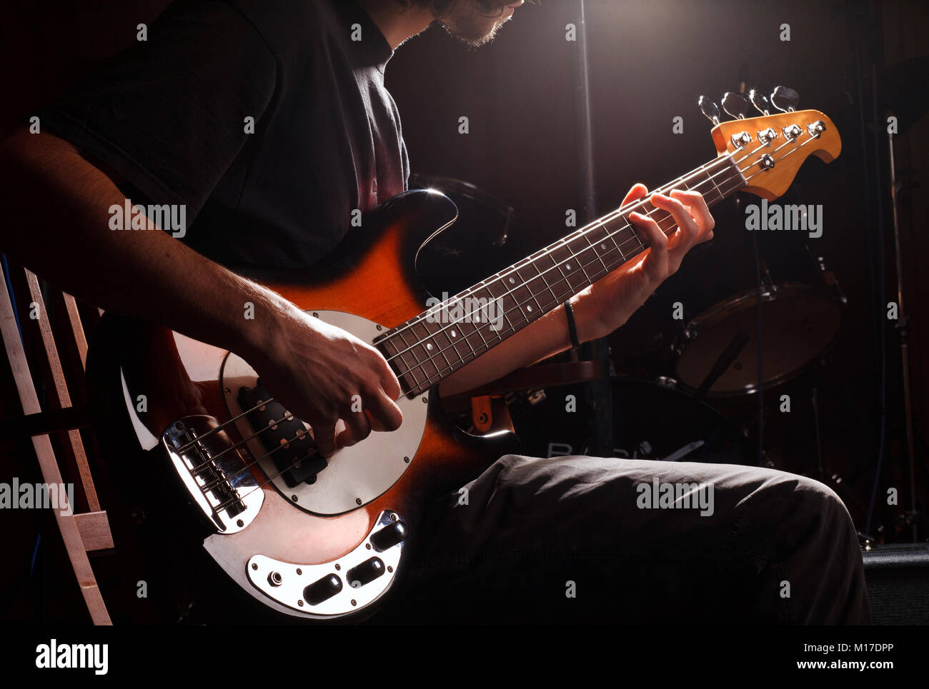 guy playing bass, guitar close-up. Rock music concepte Stock Photo - Alamy