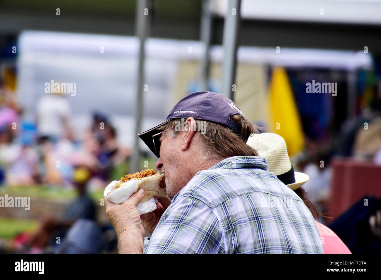 Mature man eating junk hi-res stock photography and images - Alamy