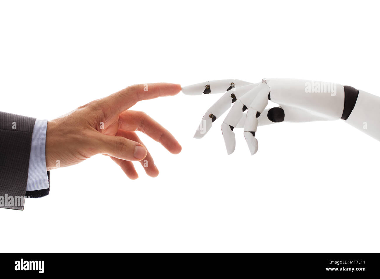 Close-up Of Businessperson Finger Touching Robotic Finger Over White ...