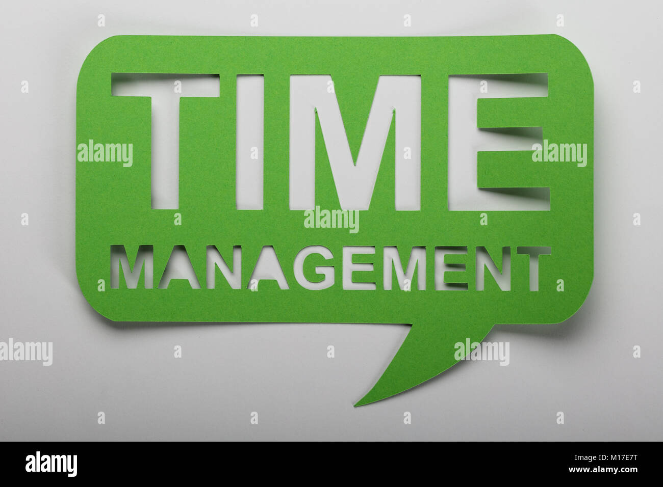 Elevated View Of Green Time Management Text Over White Background Stock ...