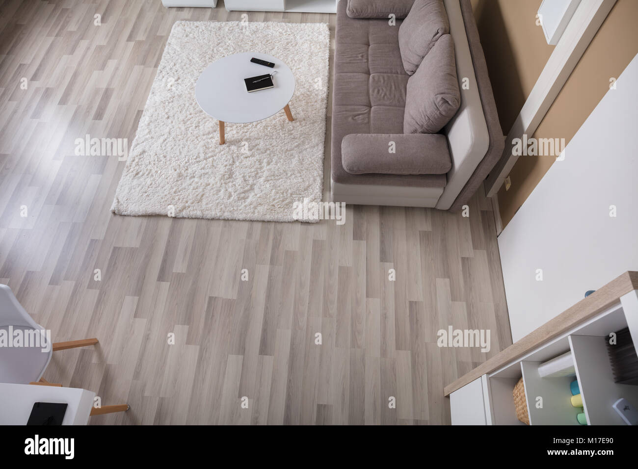 Elevated View Of Diary And Remote Control On Coffee Table Stock Photo ...