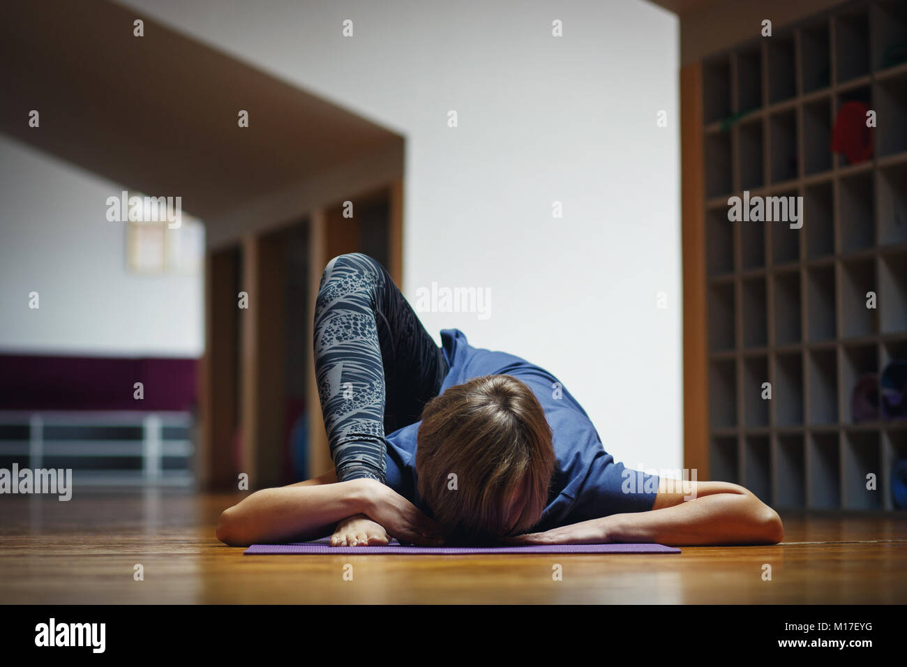 Young yogi woman practicing yoga concept. Fit woman stretching. A ...