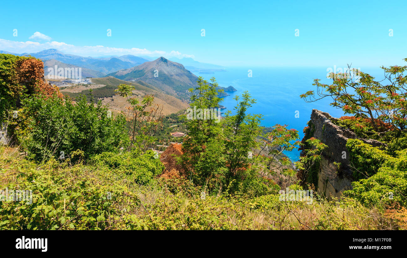 The ruins of the original settlement of Maratea on a rocky escarpment ...