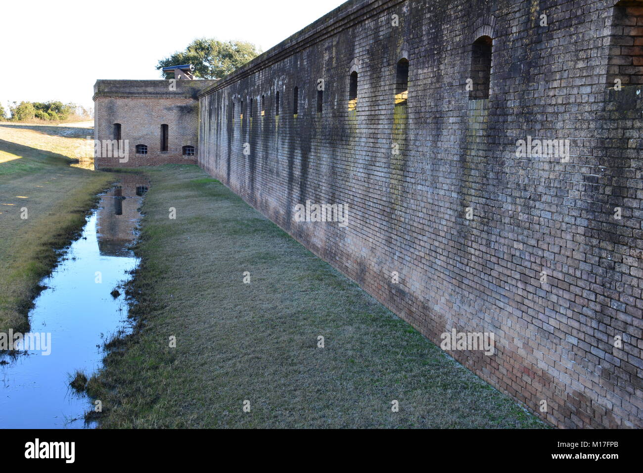 The outer walls with a moat of a fortress used in the American Civil ...