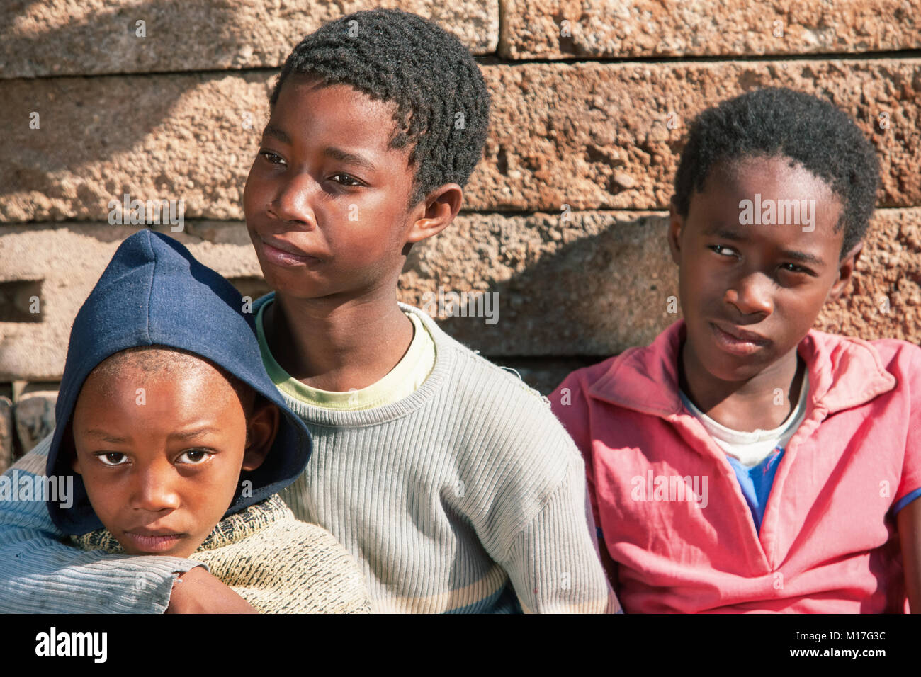 African brothers in front of the house in the village, Botswana Stock ...