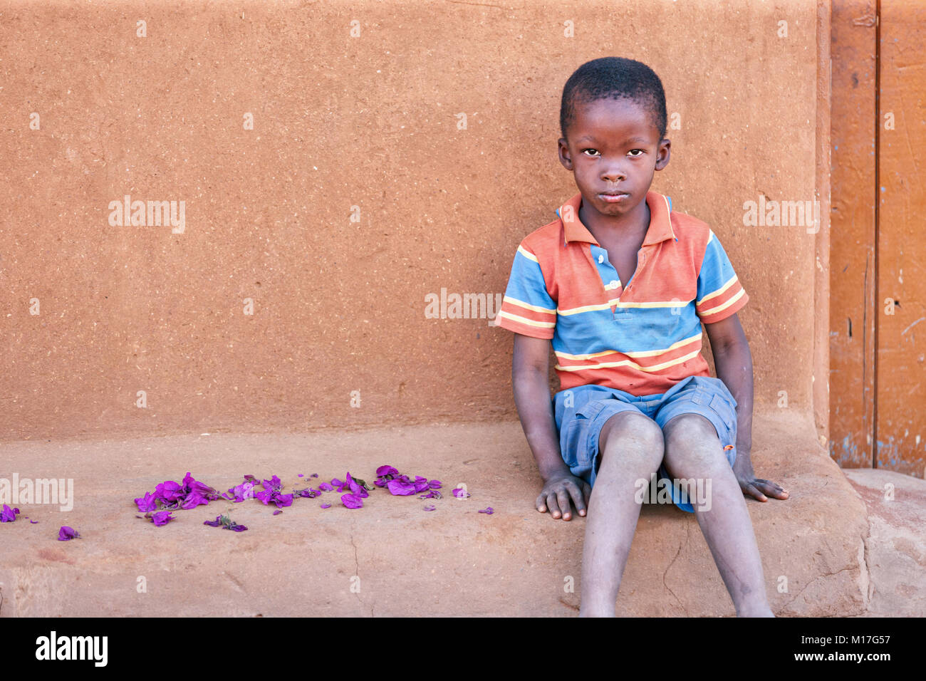 African boy in the front of the house, village, Botswana Stock Photo ...
