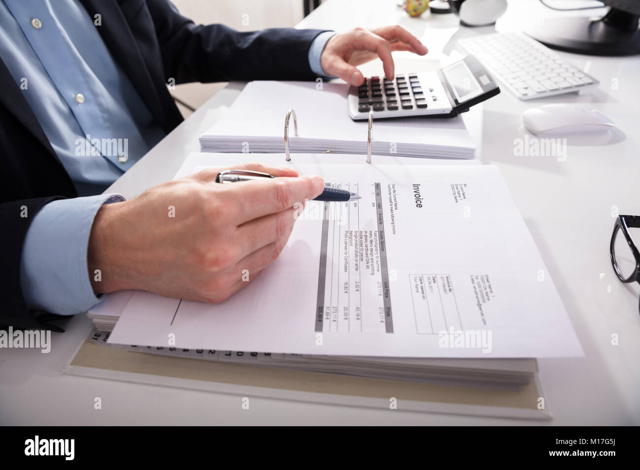 Invoice and checking hi-res stock photography and images - Alamy