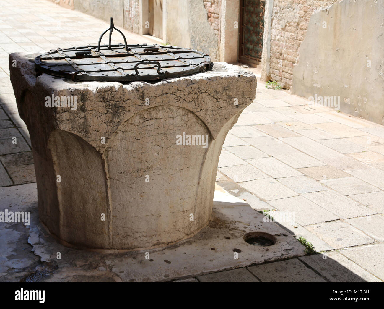 ancient white stone well for rainwater collection Stock Photo - Alamy