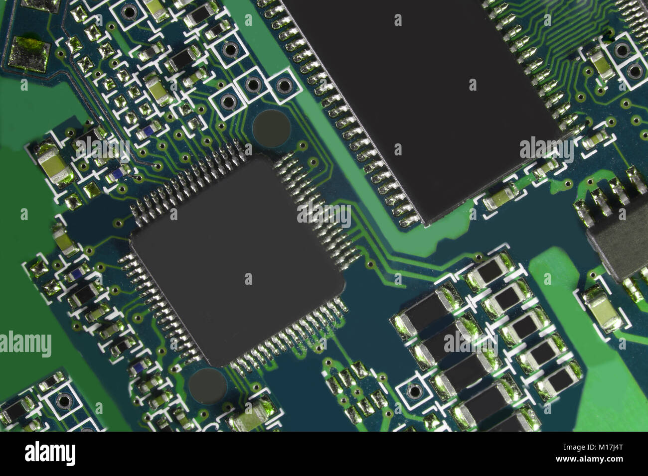 macro photography of an electronic circuit inside a modern computer ...