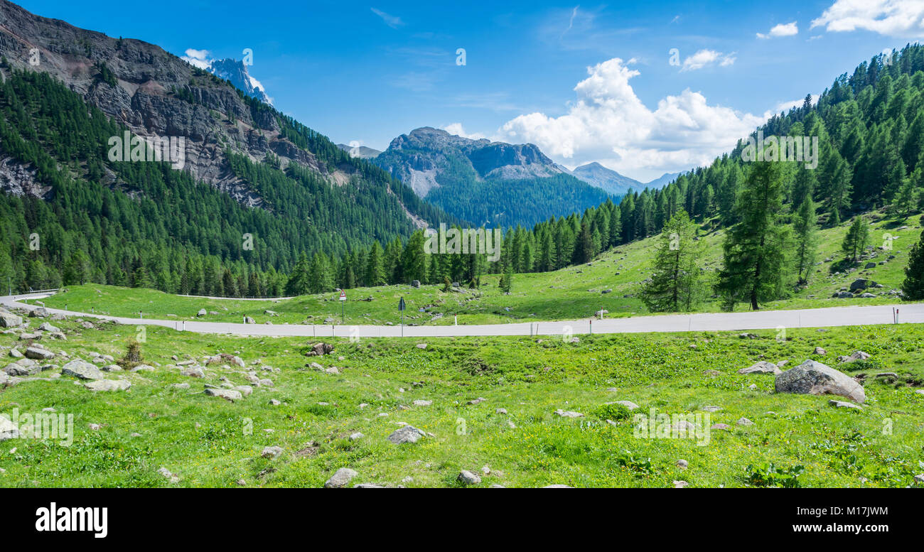 mountain landscape in summer and the dark blue sky with clouds in ...