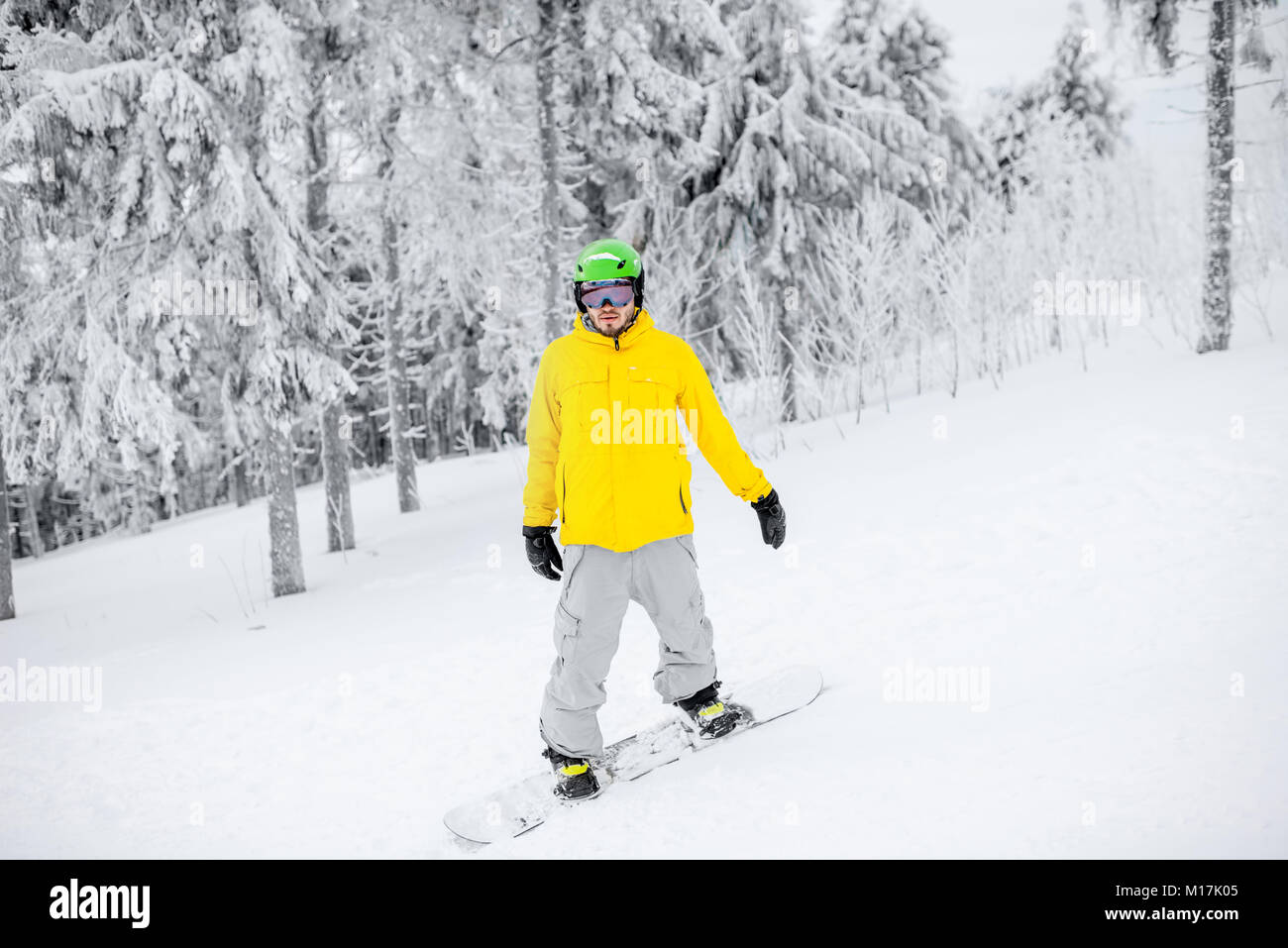 Man snowboarding at the mountains Stock Photo - Alamy