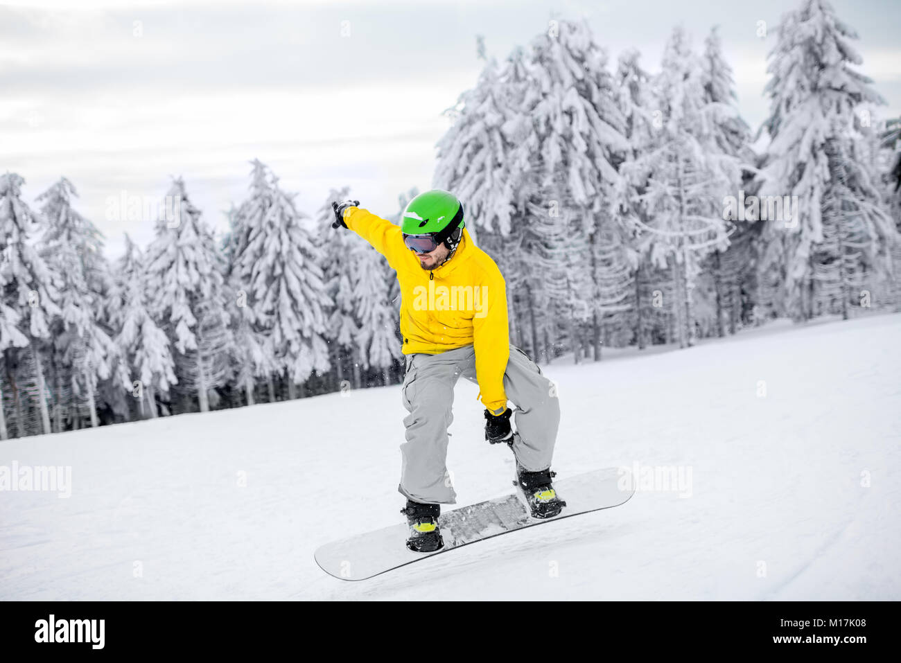 Man snowboarding at the mountains Stock Photo - Alamy