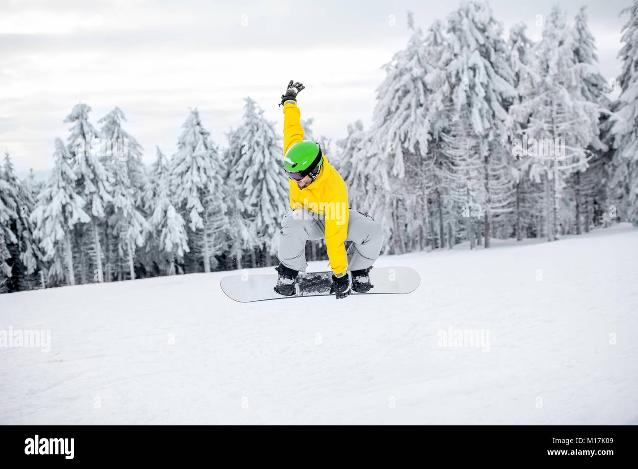 Man snowboarding at the mountains Stock Photo - Alamy