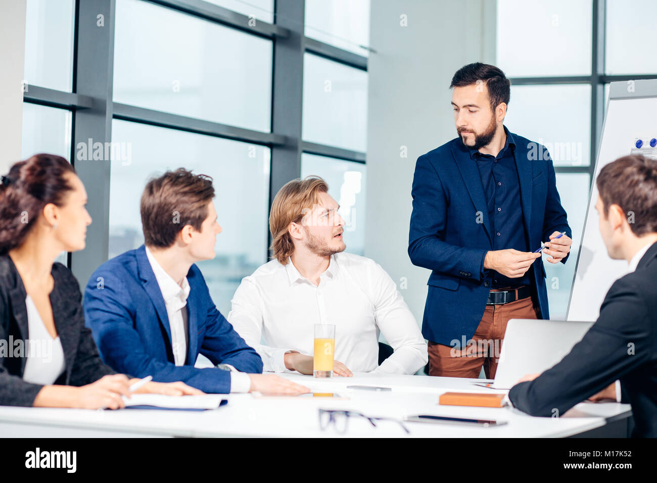 boss leader coaching in office. On job training. Business and Education ...