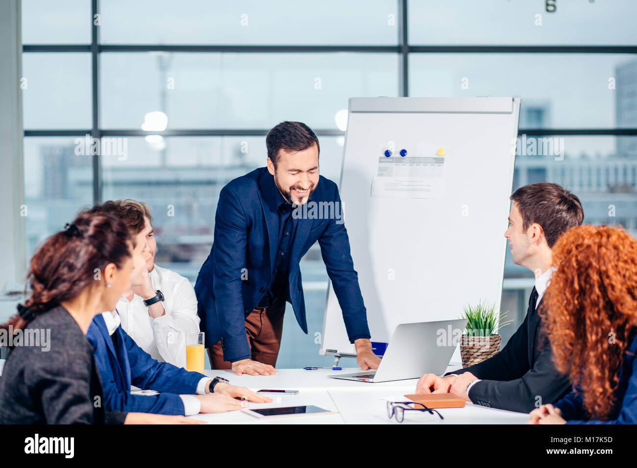 Successful business presentation of man at office Stock Photo - Alamy