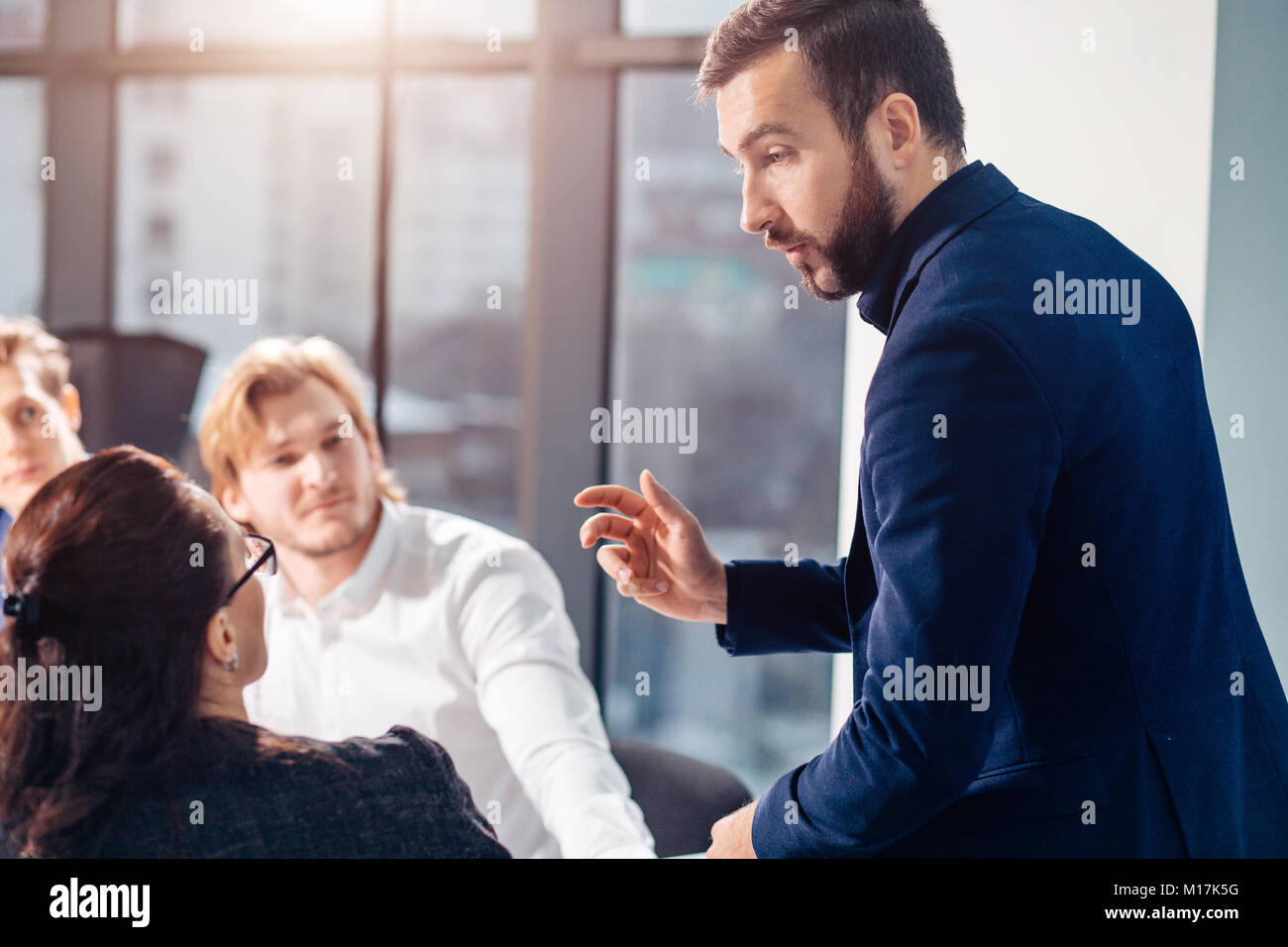 boss leader coaching in office. On job training. Business and Education ...