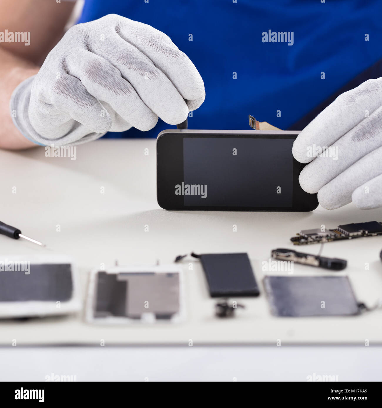 Close-up Of A Human Hand Repairing Smartphone With Screwdriver Stock ...