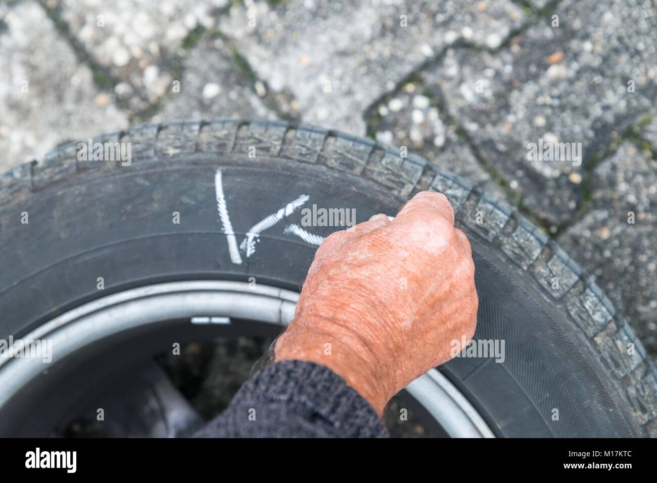 Wheel change and label the tires with crayon Stock Photo - Alamy