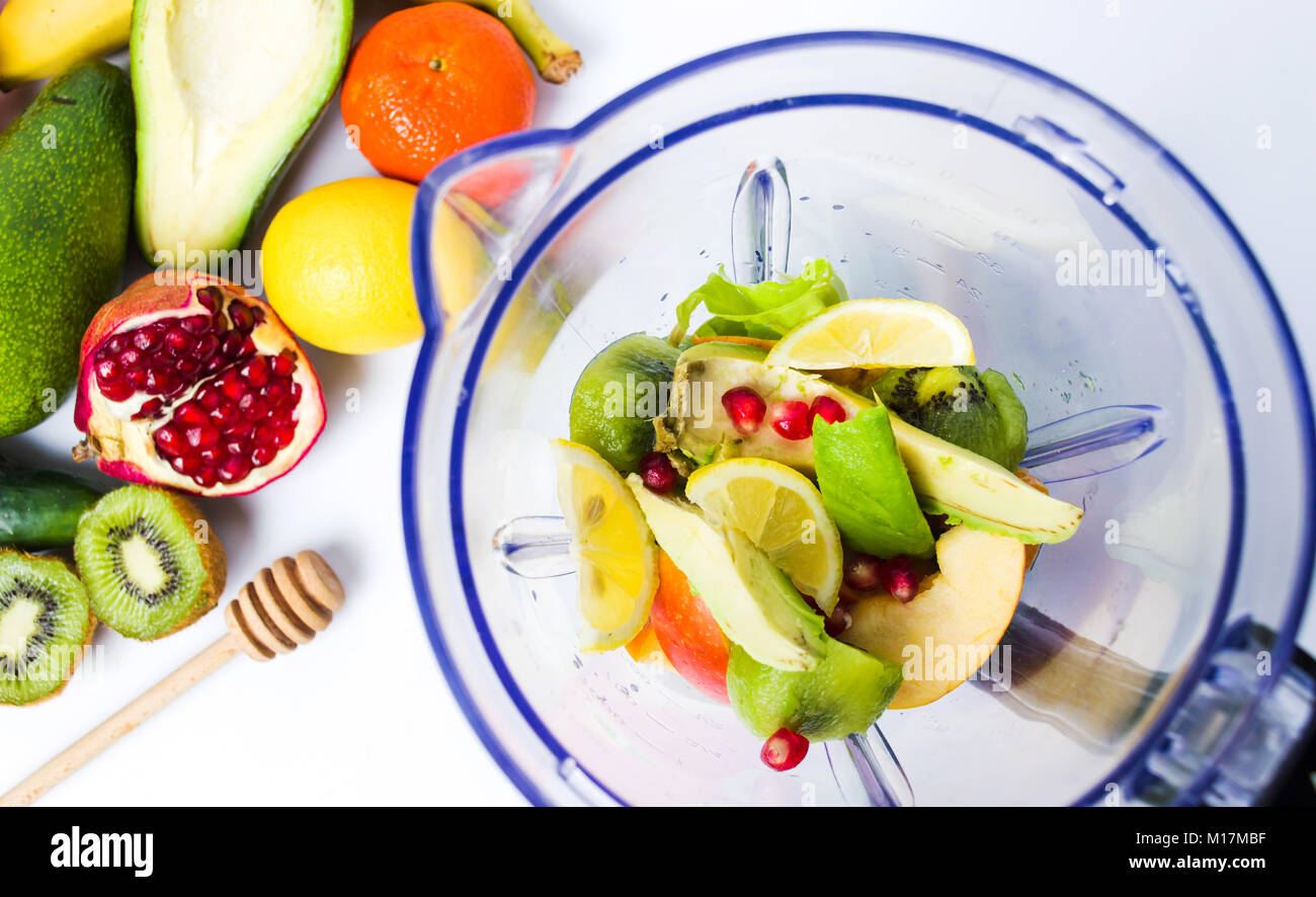 Various fruits in a blender for making a perfect smoothie Stock Photo ...