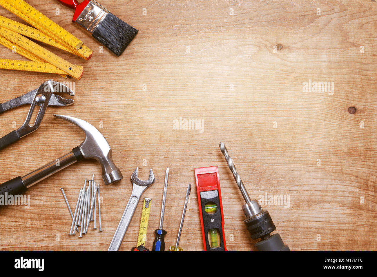Assorted work tools on wood Stock Photo - Alamy