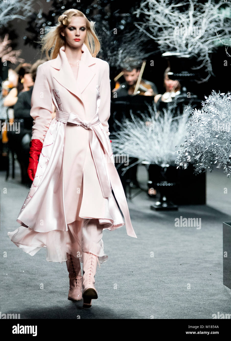 Madrid, Spain. 28th January, 2018. A model showcases designs by Isabel ...