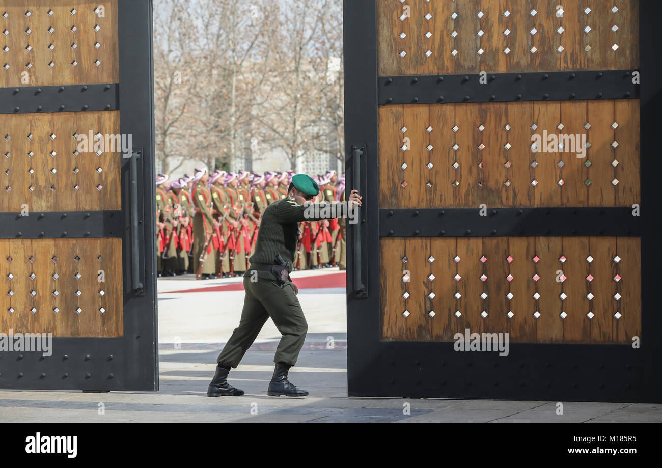 Amman, Jordan. 28th Jan, 2018. As a palace gate is opened the royal ...