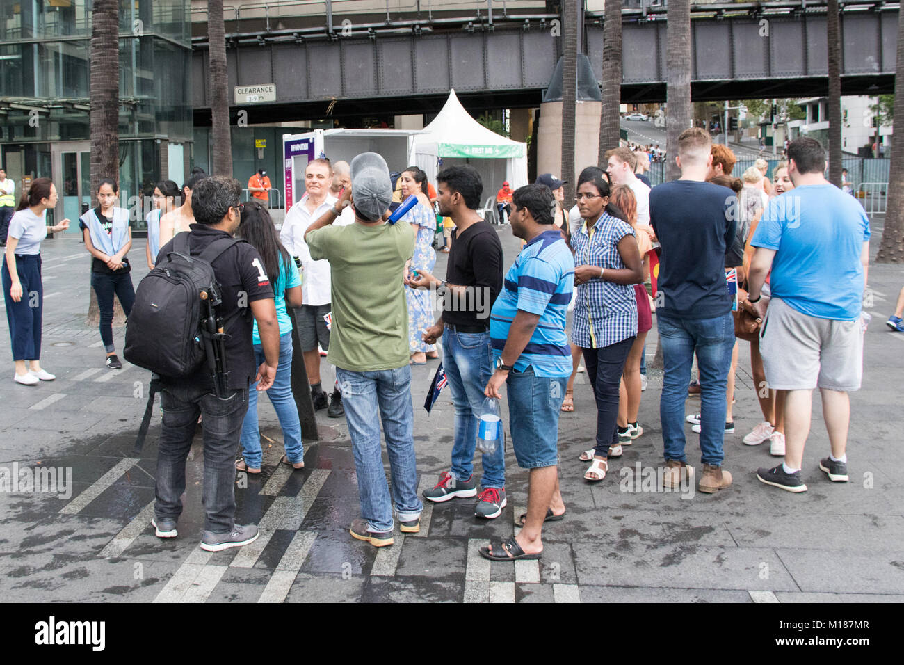 People queue for a water fountain at Circular Quay on Australia Day ...