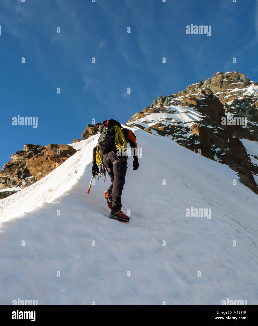 Mountaineer on narrow rocky hi-res stock photography and images - Alamy