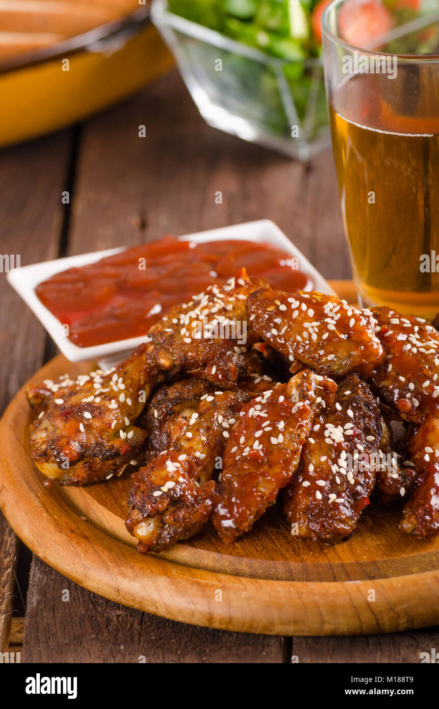 Grilled chicken wings with hot sauce. food photography, ready for ...