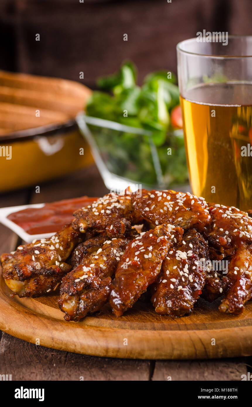 Grilled chicken wings with hot sauce. food photography, ready for ...