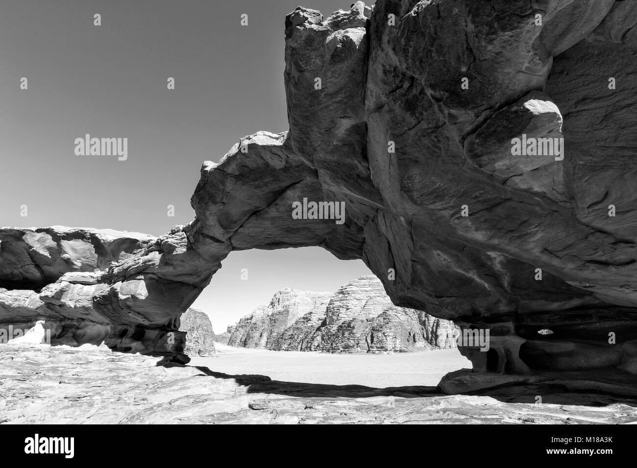 natural rock bridge and panoramic view of Wadi Rum desert, Jordan Stock ...
