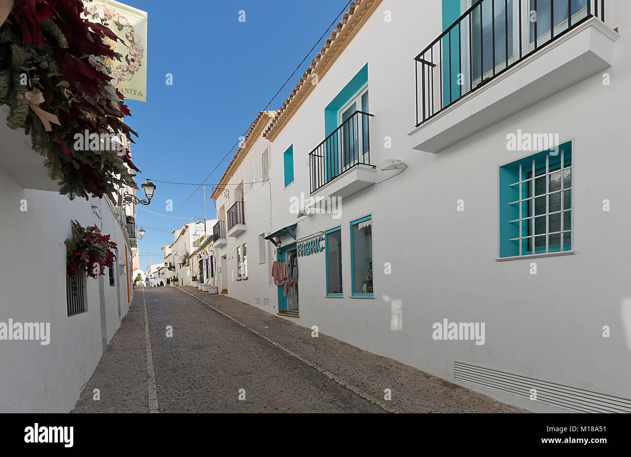 Street of the pretty village of Altea in the province of Alicante ...