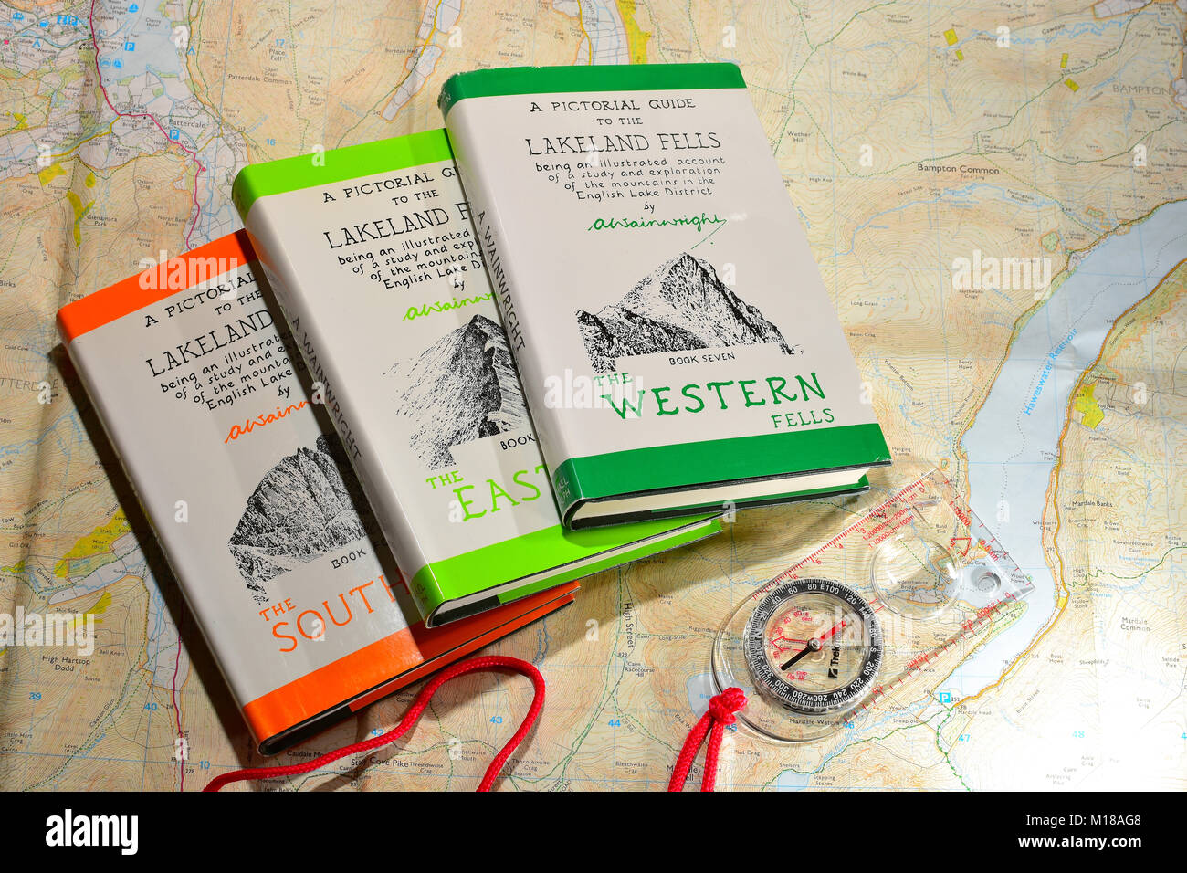Alfred Wainwright books with compass and OS maps Stock Photo - Alamy