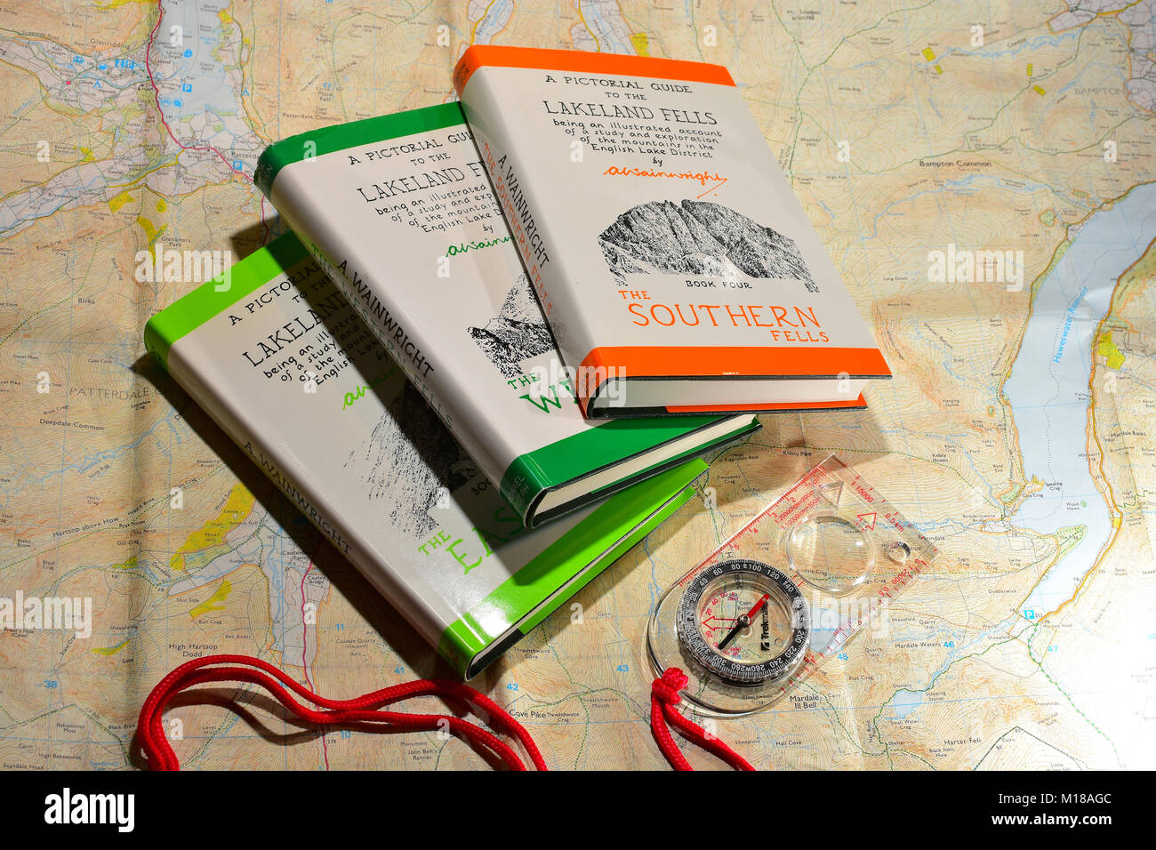 Alfred Wainwright books with compass and OS maps Stock Photo - Alamy