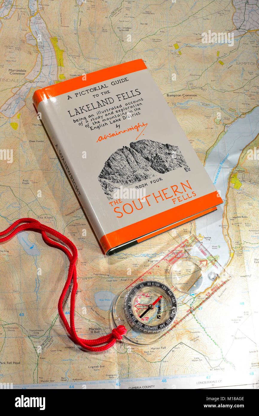 Alfred Wainwright books with compass and OS maps Stock Photo - Alamy