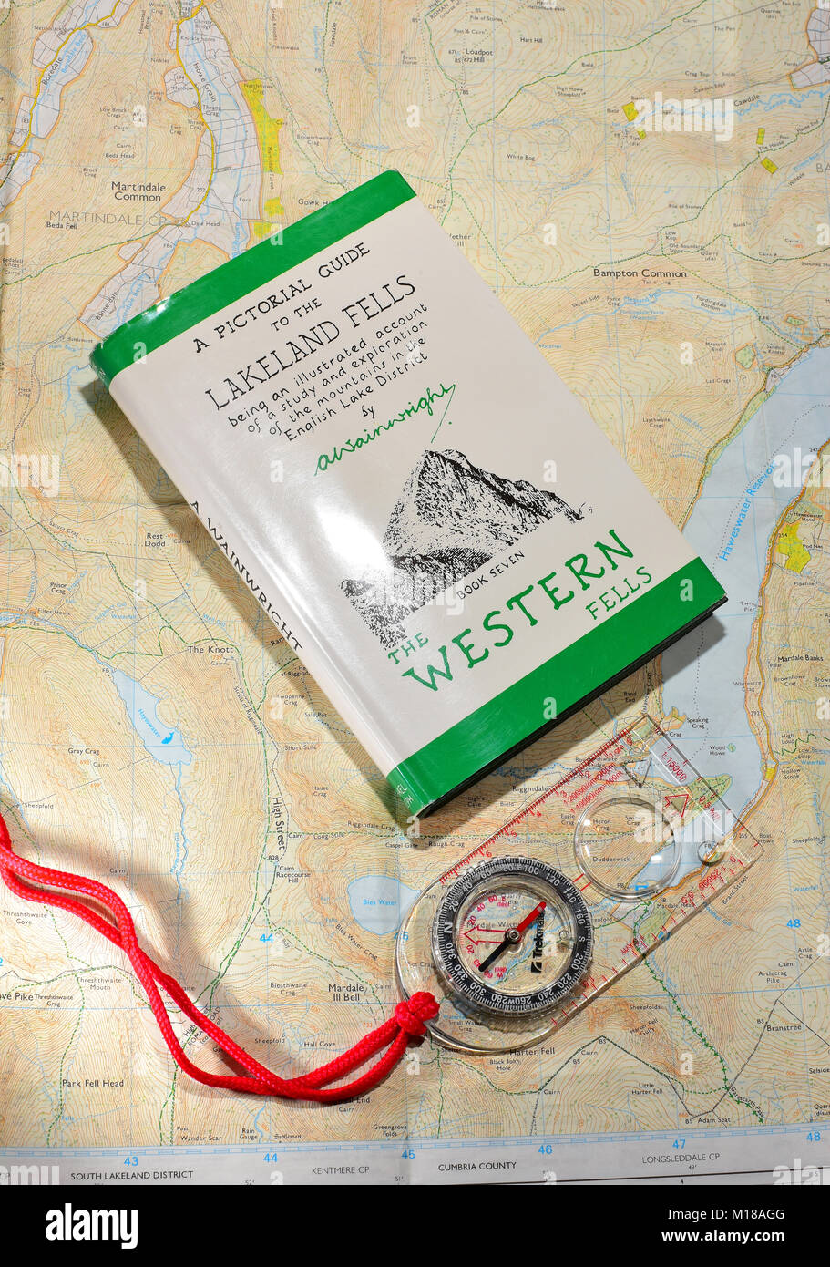Alfred Wainwright books with compass and OS maps Stock Photo - Alamy