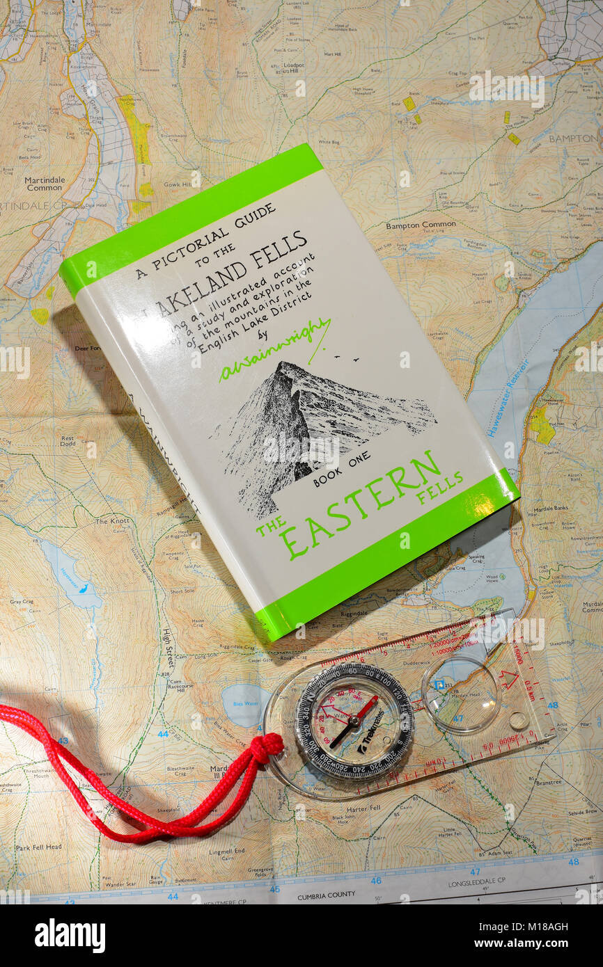 Alfred Wainwright books with compass and OS maps Stock Photo - Alamy