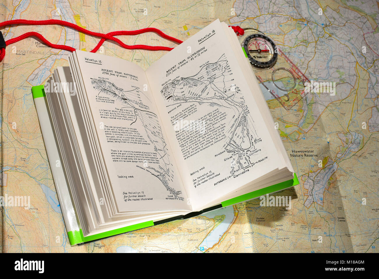 Alfred Wainwright books with compass and OS maps Stock Photo - Alamy