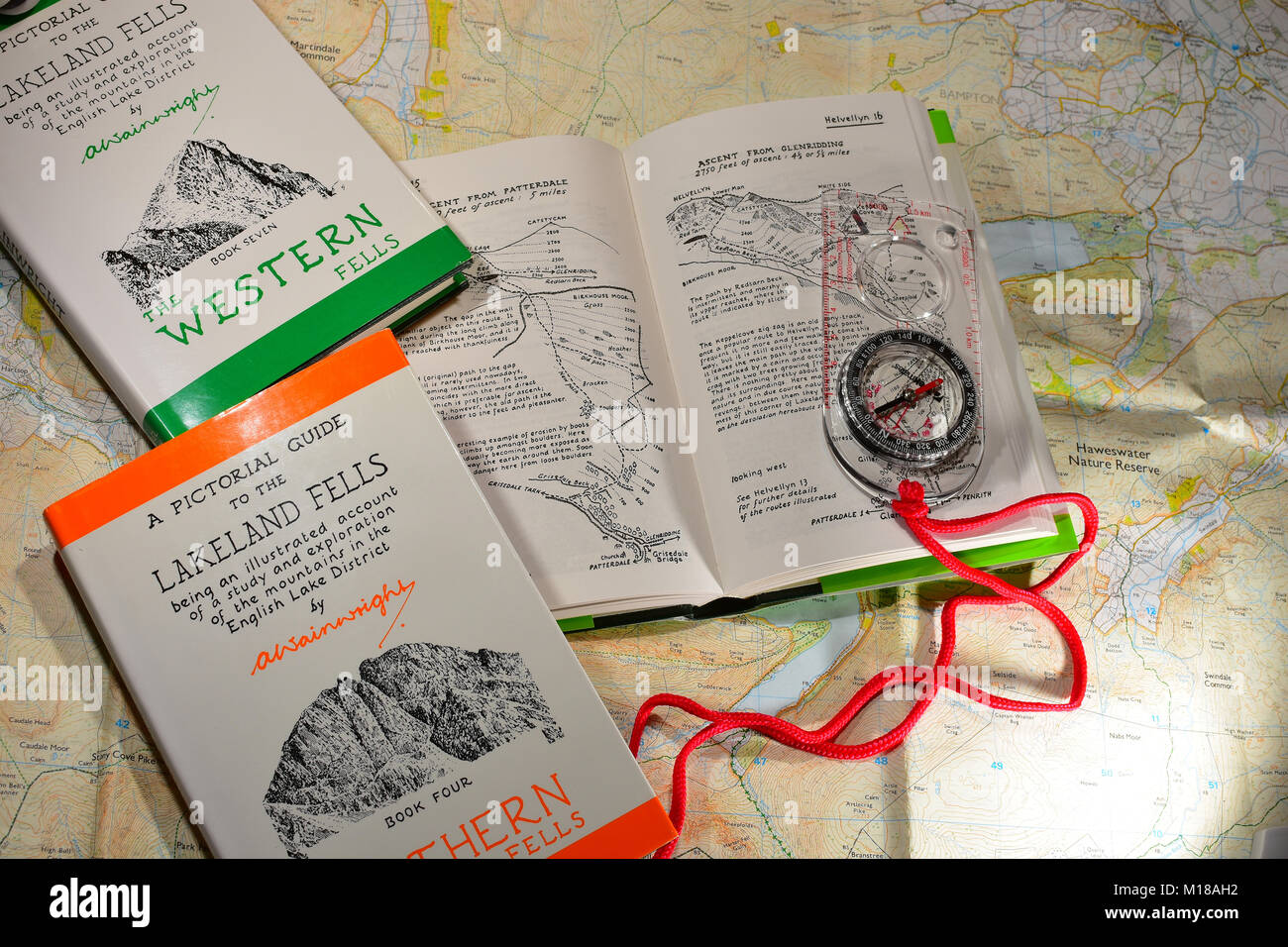 Alfred Wainwright books with compass and OS maps Stock Photo - Alamy